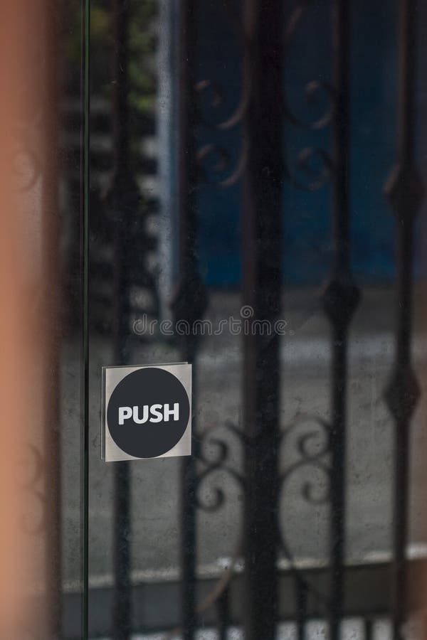 Restaurant Door Handle with Push Sign on Glass Doors. Stock Image ...