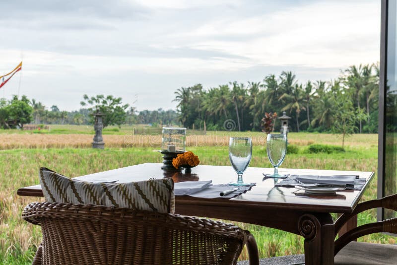 Restaurant Facing the Rice Fields in Bali, Indonesia. Traditional ...