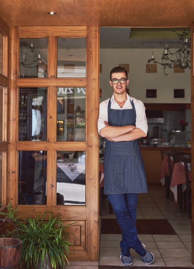 This Restaurant Feels Like Home. Shot of a Man Working at a Restaurant ...