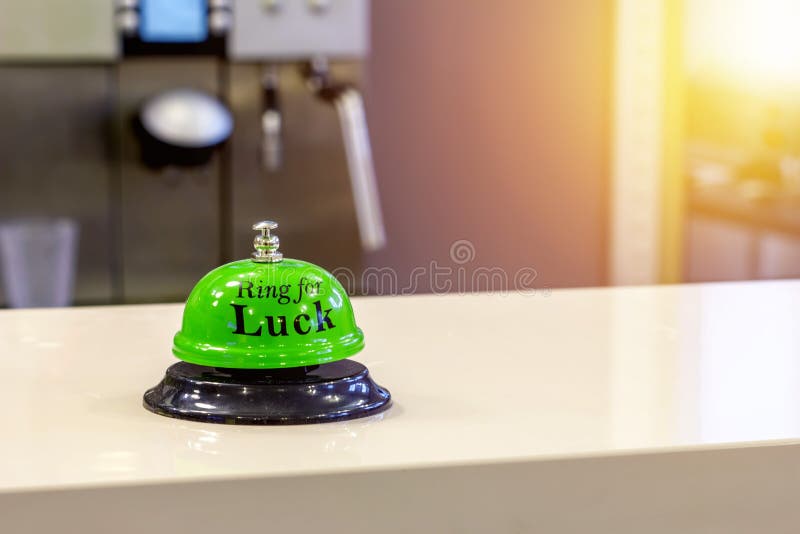 Restaurant Green Bell with Bokeh on White Table Stock Image - Image of ...