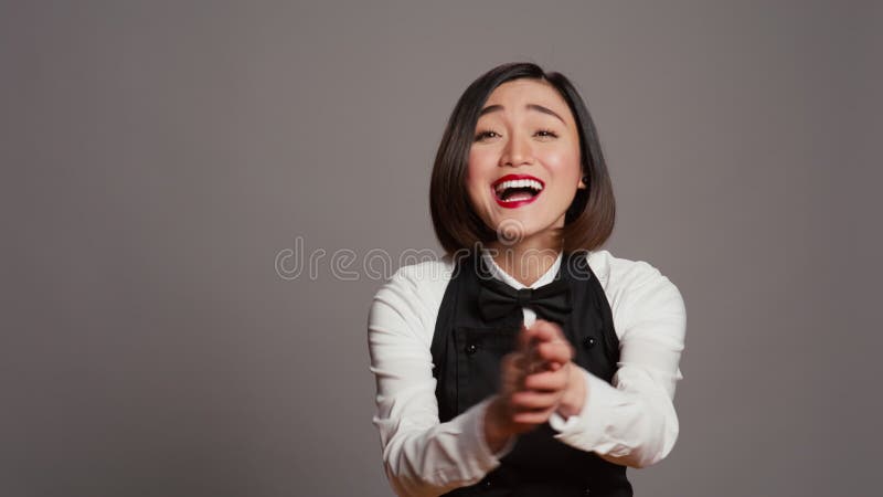 Restaurant Hostess Clapping Hands and Celebrating for Someone, Stock ...