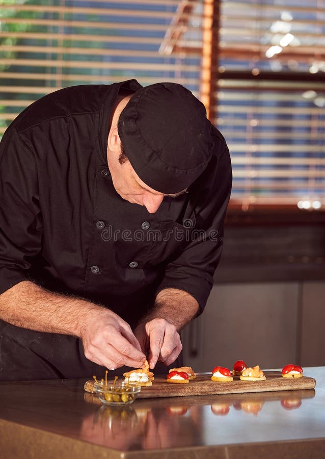 Making Canapes stock photo. Image of finger, tomatoes - 47674104