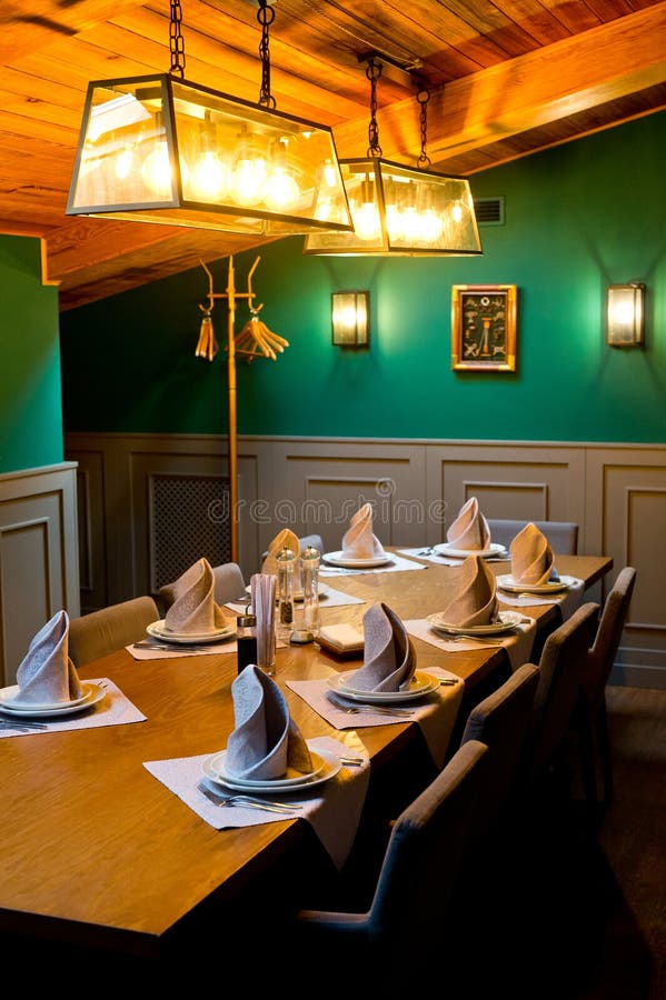 Restaurant Interior with a Table Served with Dishes and Artificial ...