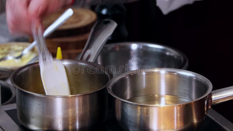 Restaurant Kitchen - the Chef Making Sauces for the Meals Stock Footage ...