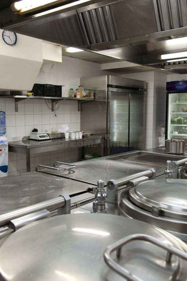 Restaurant kitchen inside stock photo. Image of pots - 19748546