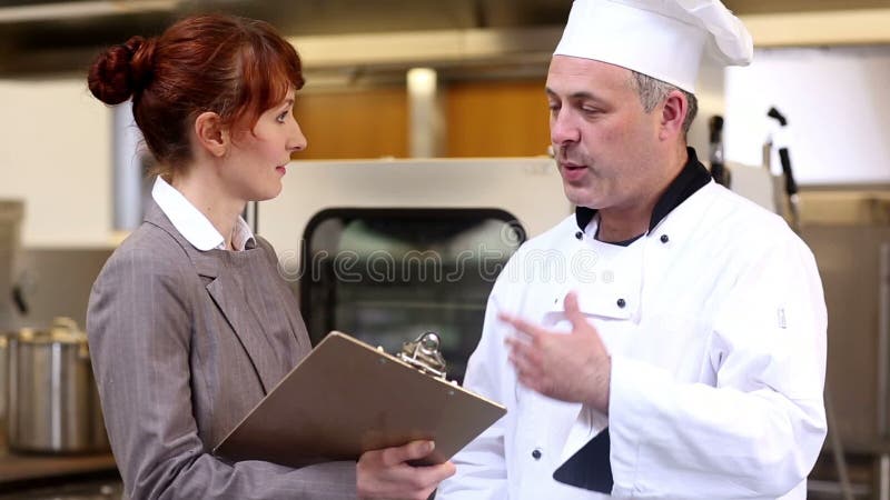 Restaurant Manager Chatting with Waiter and Head Chef Stock Footage ...