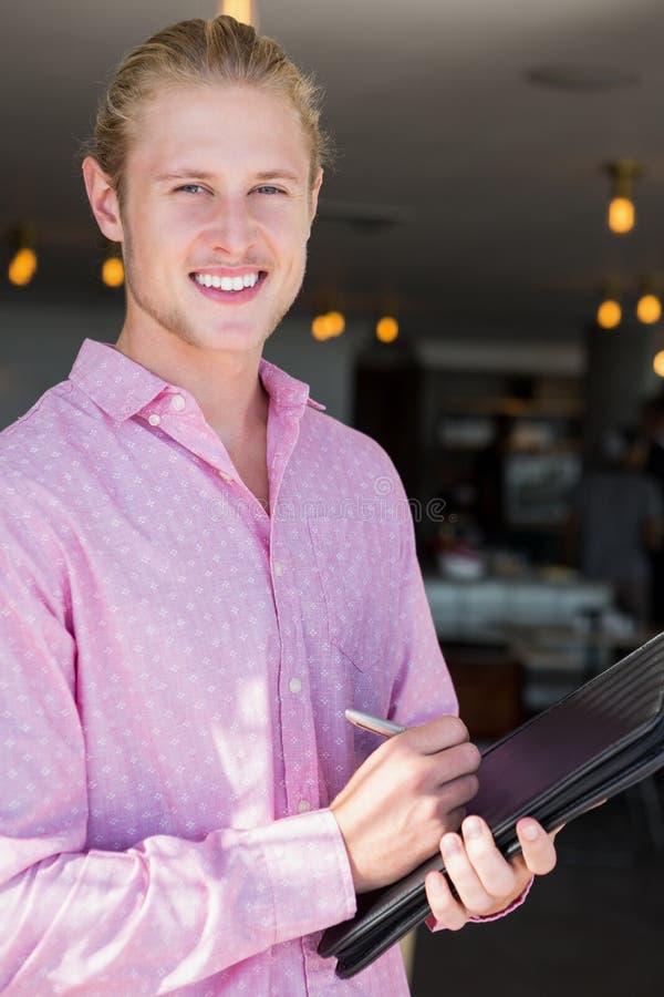 Restaurant Manager Holding Organizer Stock Image - Image of expertise ...