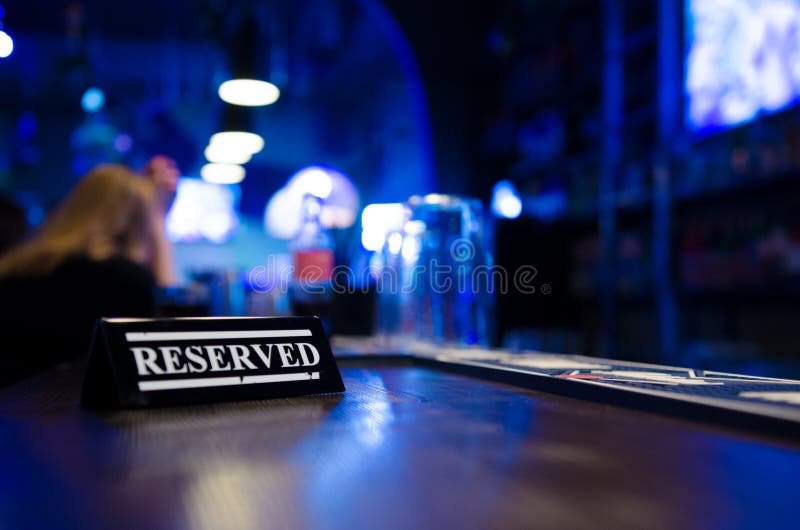 Restaurant Reserved Table Sign Standing on Wooden Table in Bar Stock ...