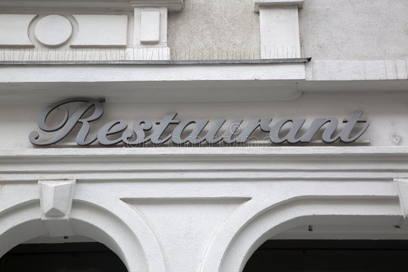 Restaurant Sign on Building Stock Image - Image of sign, building ...