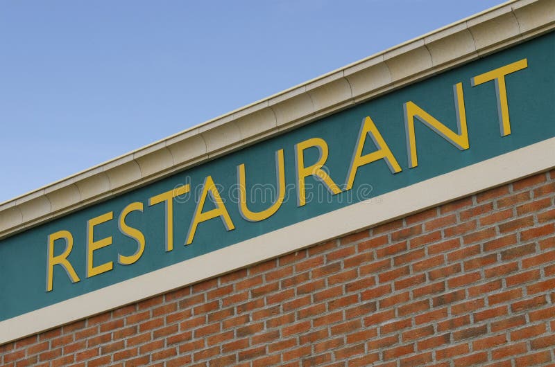 Restaurant Sign on a Facade Stock Photo - Image of sign, restaurant ...