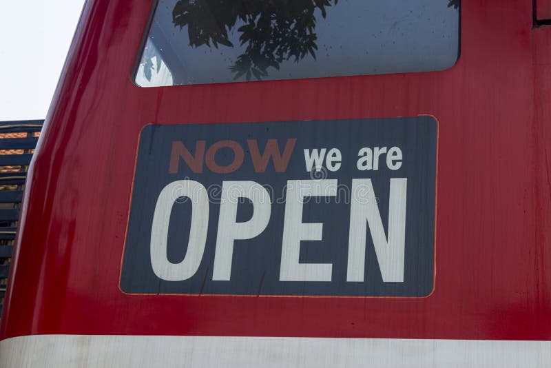A Restaurant Sign Saying that Now we are Open Stock Image - Image of ...