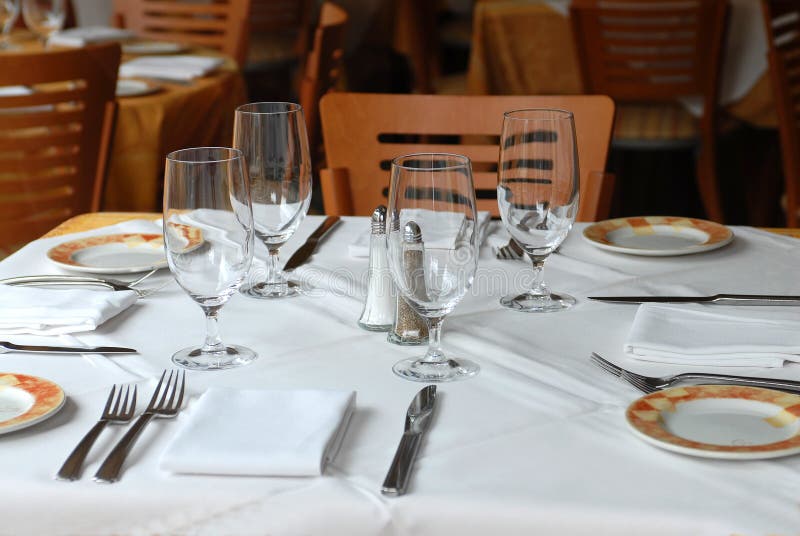 Bread at restaurant table stock image. Image of cutlery - 23718293
