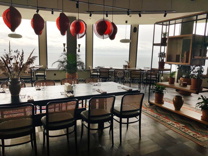 Restaurant Table with Chairs, Beautiful Interior and Panoramic Windows ...