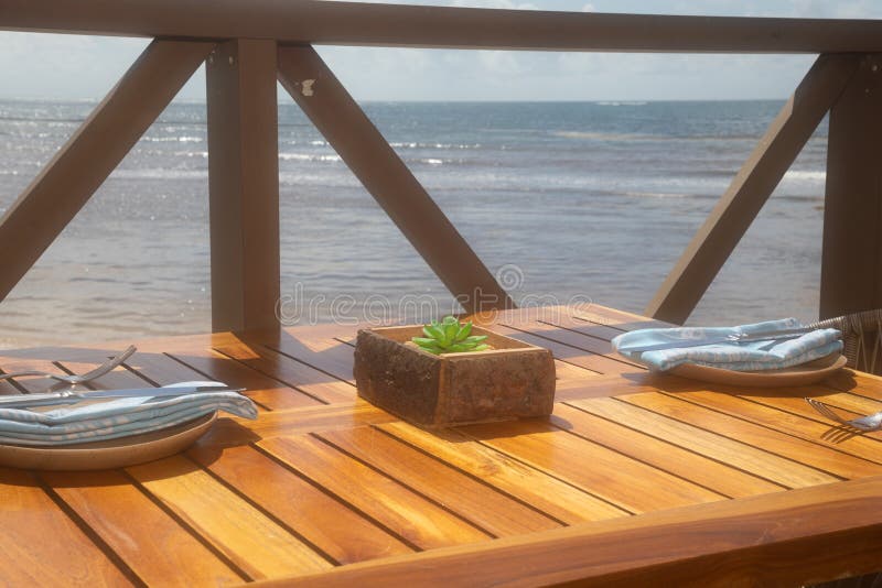 Restaurant Table with Cutlery Settings Overlooking Ocean Stock Photo ...