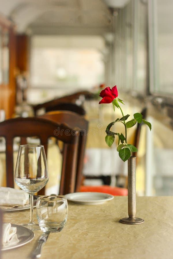 Restaurant table with rose stock photo. Image of celebration - 92348764