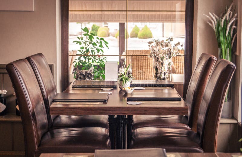Restaurant Table with Seats and Menu`s Stock Photo - Image of long ...