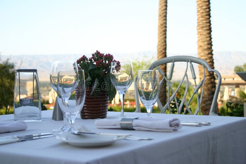 Restaurant table at sunset stock photo. Image of starched - 734572