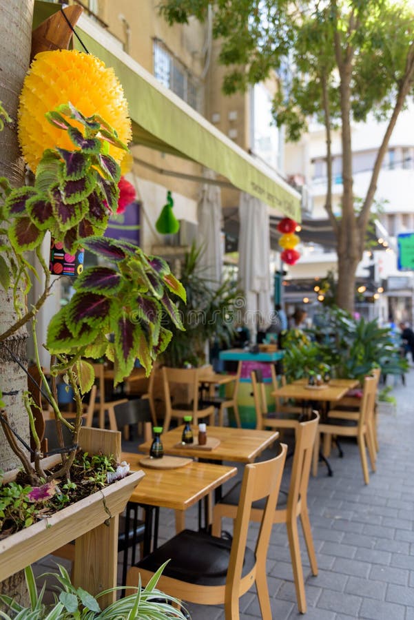 Restaurant Tables on Sidewalk Stock Photo - Image of tables, sidewalk ...