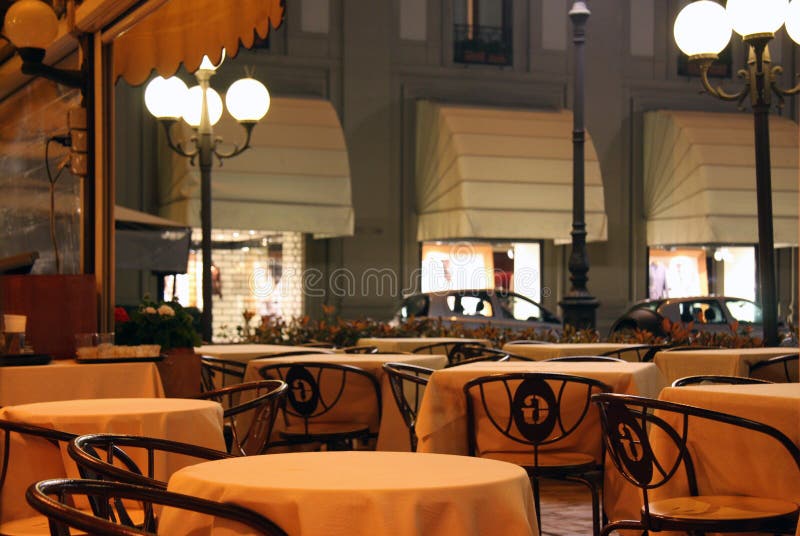 Restaurant at night stock image. Image of table, paved - 4375469
