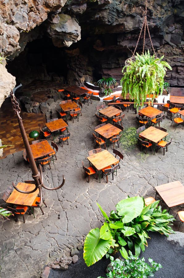 Restaurant in volcano cave stock photo. Image of hole - 29193670