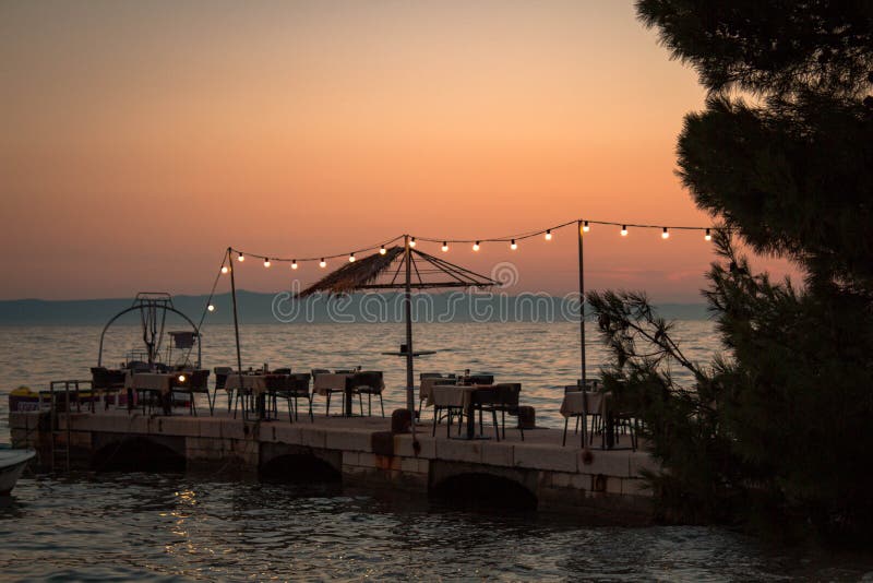Restaurant on Water, Sunset Landscape on Sea Stock Image - Image of ...