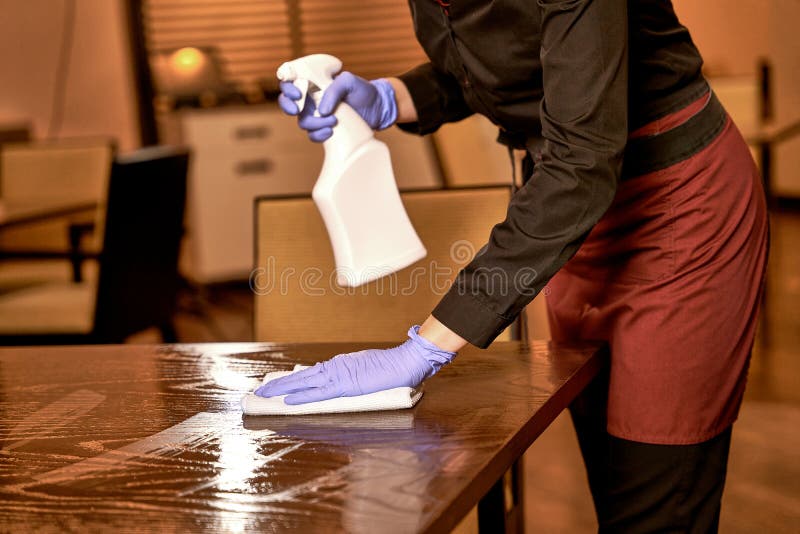 Restaurant Worker Washing a Sprayed Table with Cloth Stock Photo ...