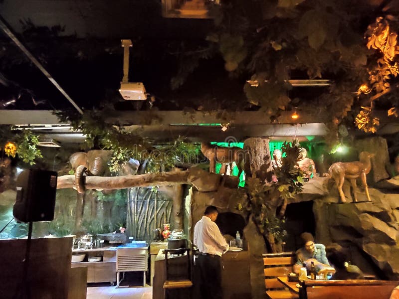 Restaurants with Theme of Jungle with Wild Animals in the Background ...
