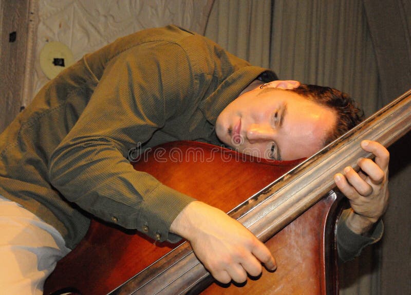 Resting Bass Player stock image. Image of male, concert - 7085769