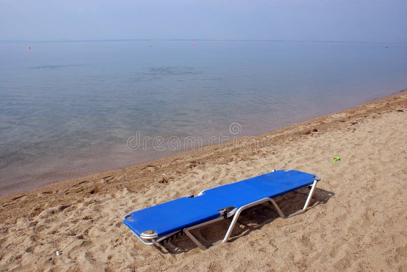 Resting on beach stock photo. Image of waves, tanning - 15088204
