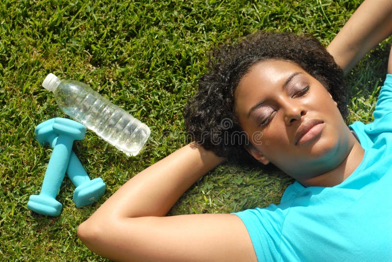 Resting after exercise stock photo. Image of dumbbells - 5631724