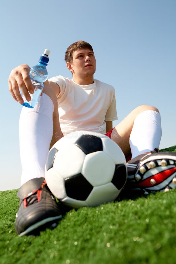 Resting footballer stock image. Image of hobby, champion - 14637381
