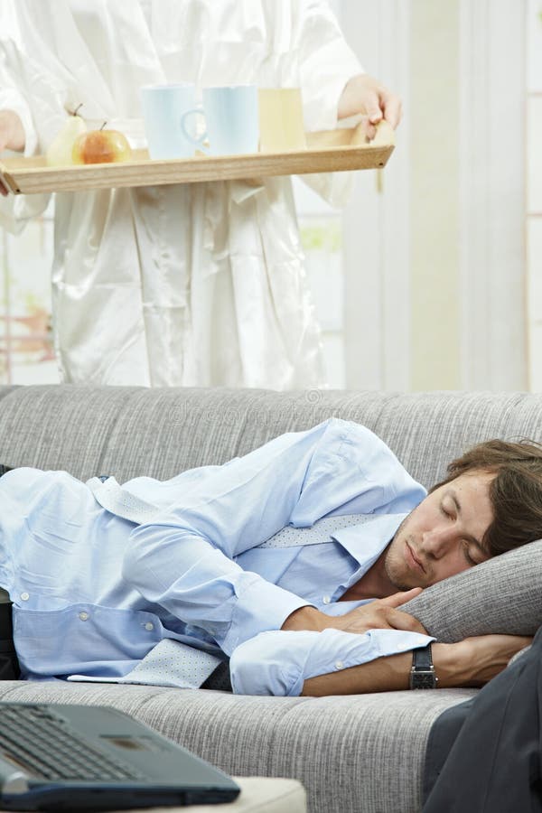 Businessman Resting on Sofa Stock Image - Image of businessperson ...