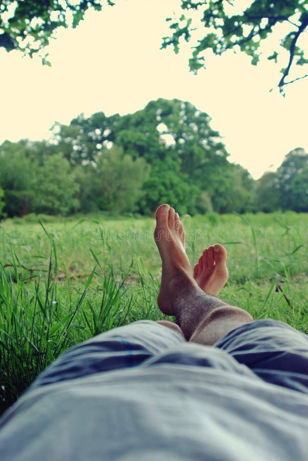 Resting in Nature Wit Feet in the Grass Stock Photo - Image of escape ...