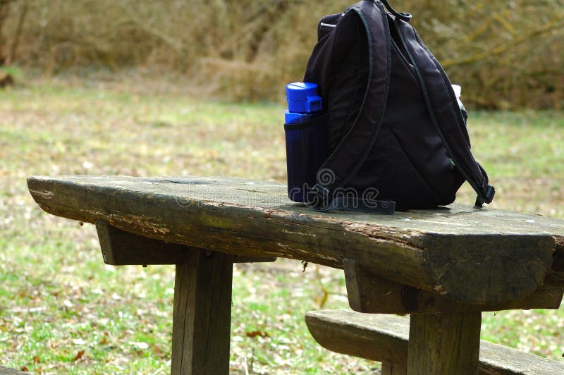 Resting Place with a Backpack. the Field is the Backround Stock Image ...