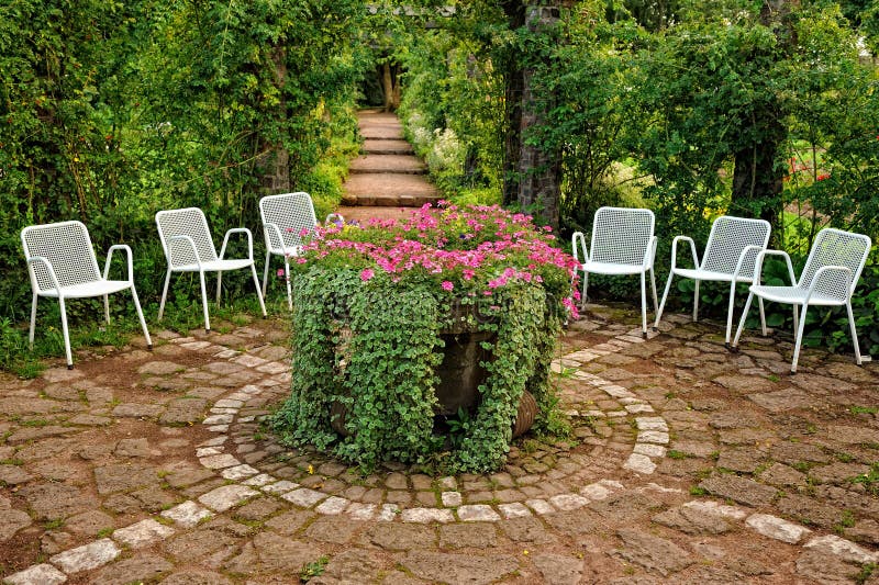 Resting Place In The Garden Stock Photo - Image of alley, peaceful ...