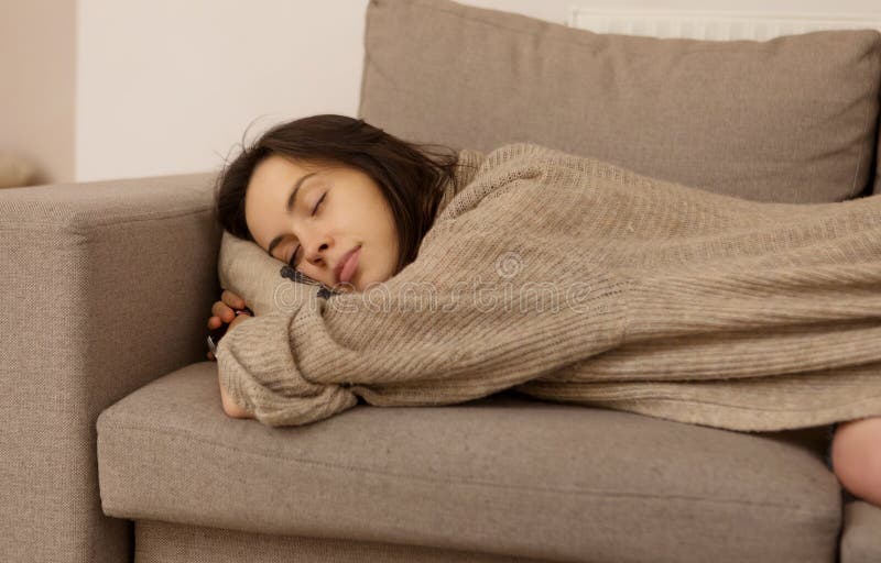 Resting on sofa. stock photo. Image of cozy, morning - 92208892