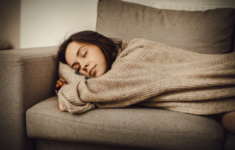 Resting on sofa. stock image. Image of domestic, attractive - 96143893