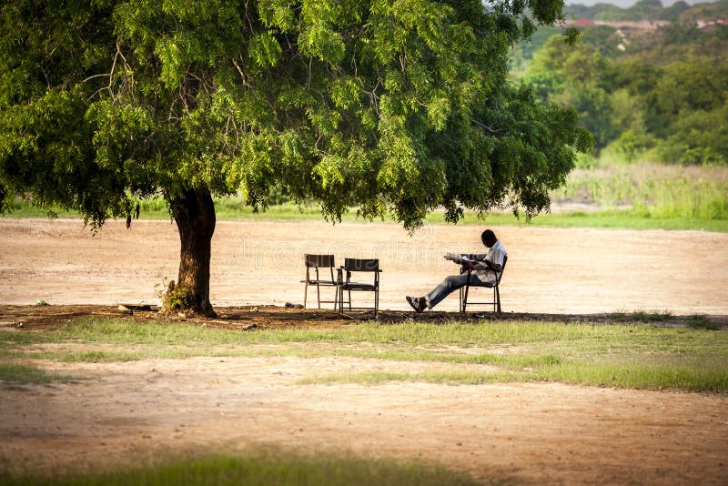 Resting under a tree editorial photography. Image of ghana - 37525157