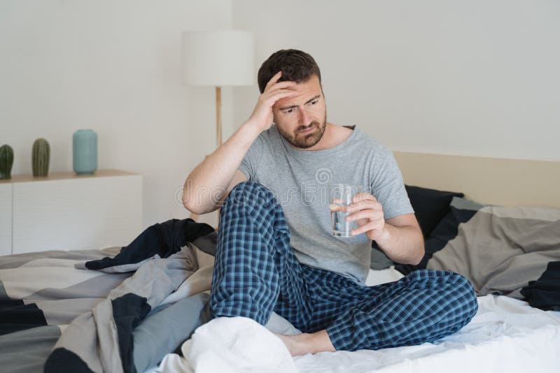 Restless Man Waking Up Early with Headache after Rough Night Stock ...