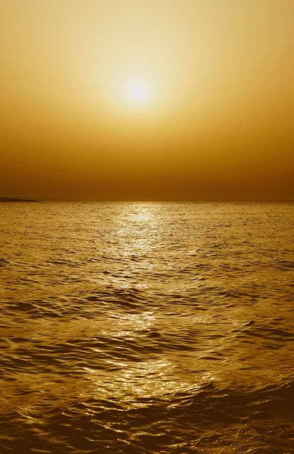 Restless Undulating Sea Under the Dim Glow of the Sun Rays Stock Image ...
