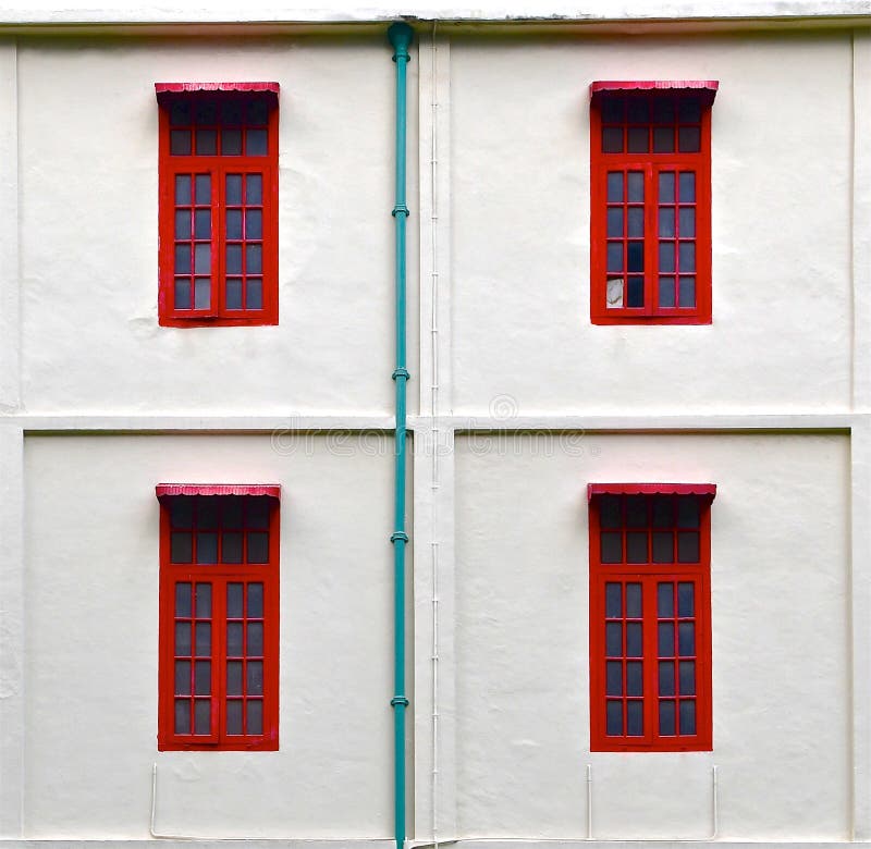 Four Red Windows on a White Stone Wall Stock Photo - Image of building ...