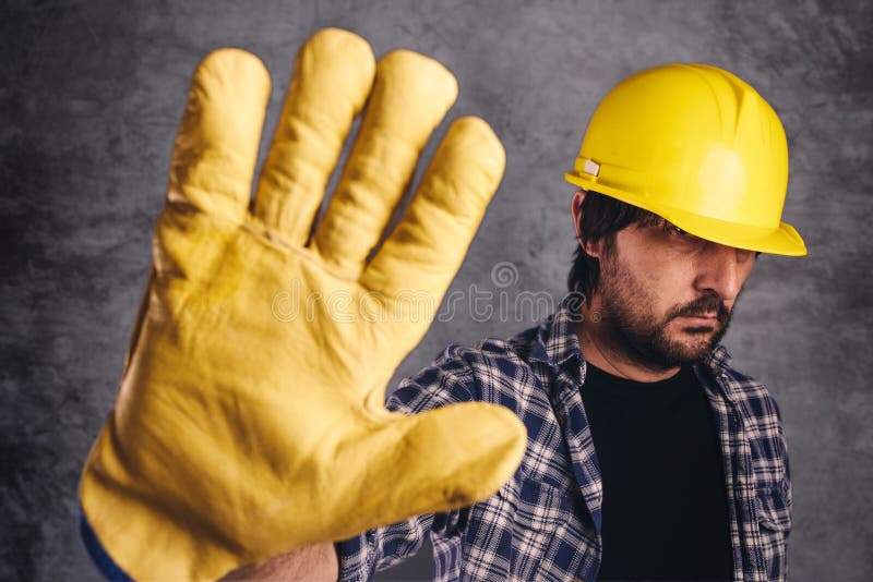 Restricted Access, Construction Worker Gesturing Stop Sign Stock Photo ...
