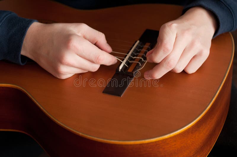 Restring a Classical Guitar, Close Up Stock Photo - Image of restring ...