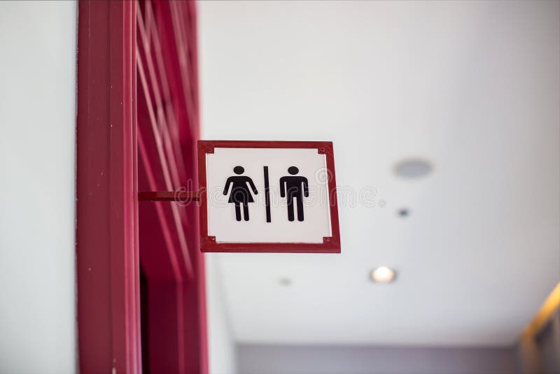 Restroom Sign Hanging on the Ceiling in the Department Store. Stock ...