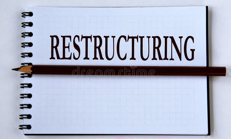 RESTRUCTURING - Word in White Notebook on White Background with Pencil ...