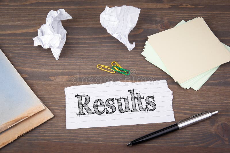 Results. Paper Sheet from the Booklet on the Wooden Table Stock Photo ...