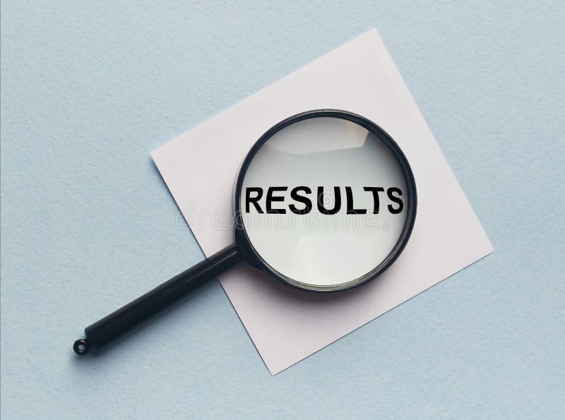 Results Word on White Paper Note through Magnifying Glass on Blue ...