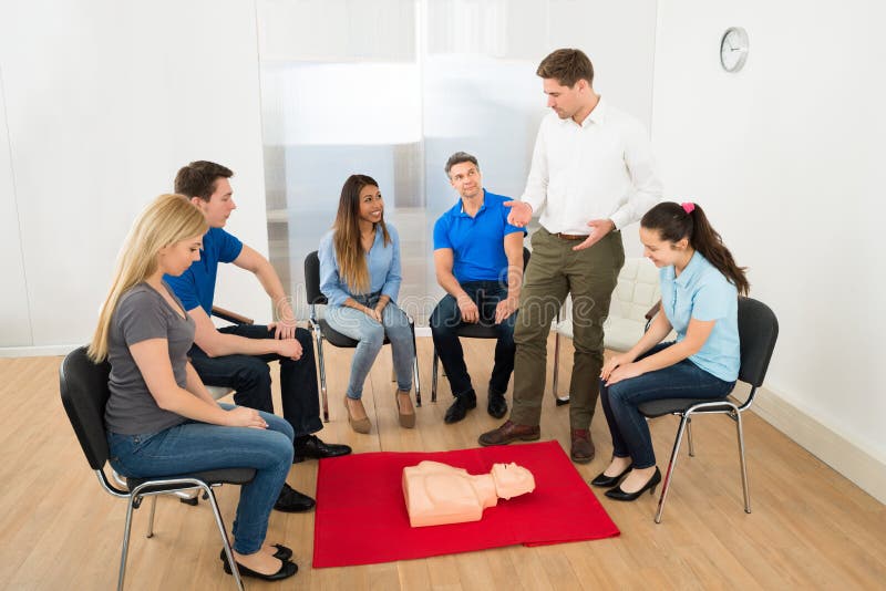 Resuscitation Training Using First-aid Dummy Stock Photo - Image of ...