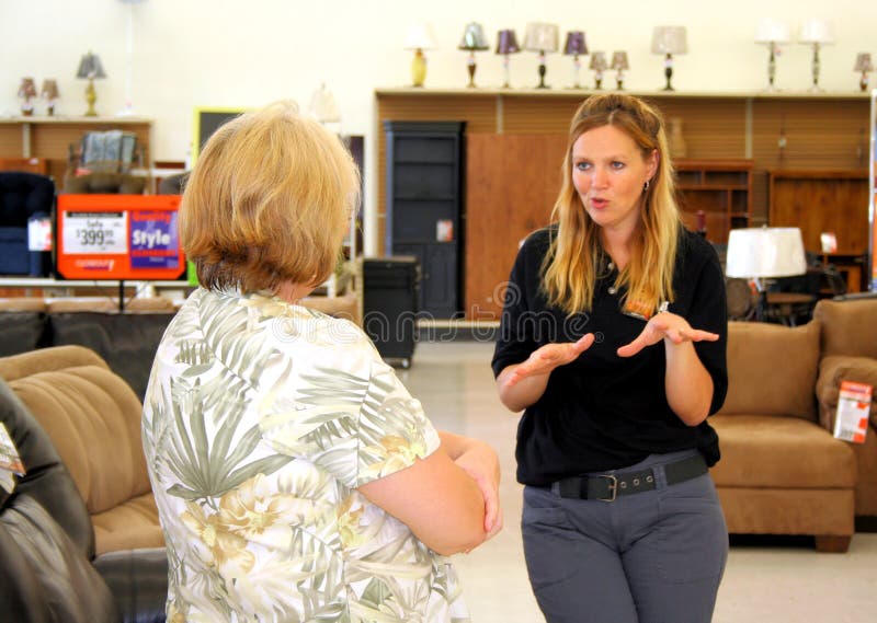 Retail Associate Helping Customer Stock Image - Image of furniture ...