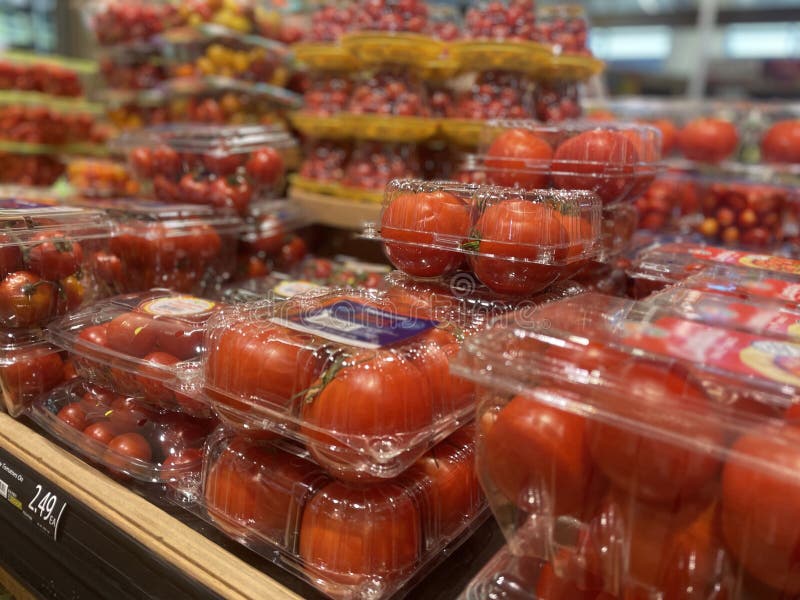 Retail Grocery Store Tomato Variety Display Produce Department ... Retail Grocery Store Tomato Variety Display Produce Department ...